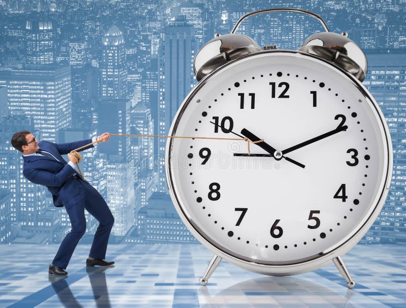 Businessman Pulling Clock In Time Management Concept Stock Image ...
