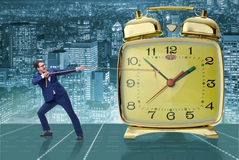 The Businessman Pulling Clock in Time Management Concept Stock Image ...
