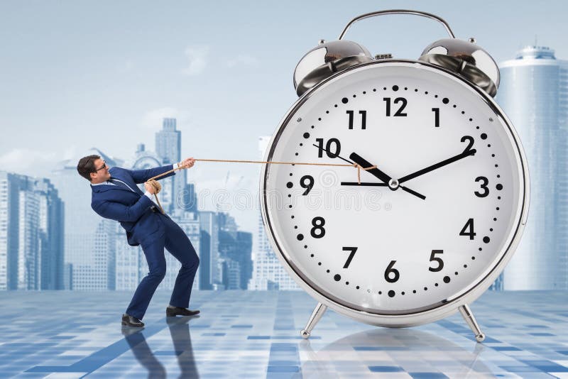 The Businessman Pulling Clock in Time Management Concept Stock Image ...