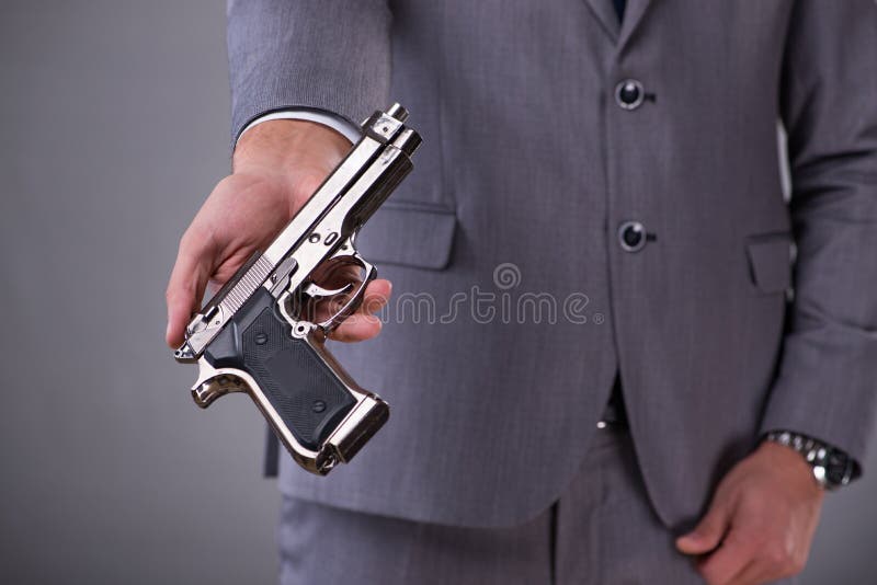 Man Pulling Gun Out Pocket Stock Photos - Free & Royalty-Free Stock ...