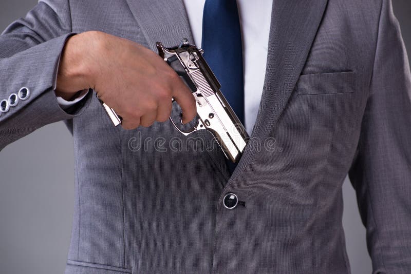 Man Pulling Gun Out Pocket Stock Photos - Free & Royalty-Free Stock ...