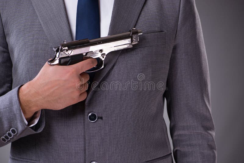 Man Pulling Gun Out Pocket Stock Photos - Free & Royalty-Free Stock ...