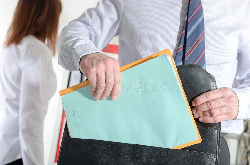 Businessman Pulling Out Folders from His Briefcase Stock Photo - Image ...