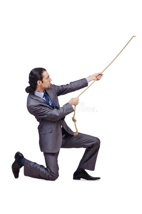 Businessman pulling rope stock photo. Image of power - 26630910