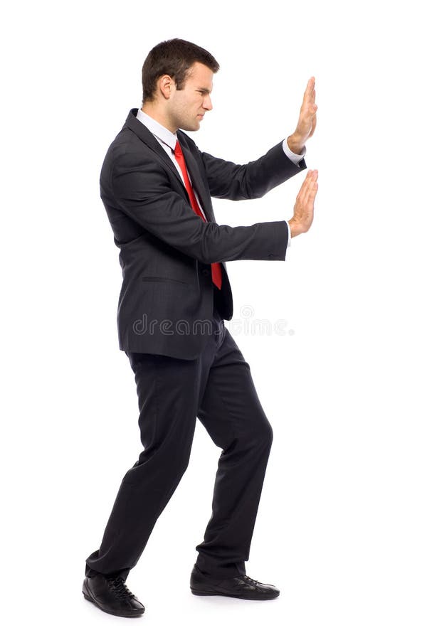 Businessman Pushing Something Stock Photo - Image of young, struggle ...