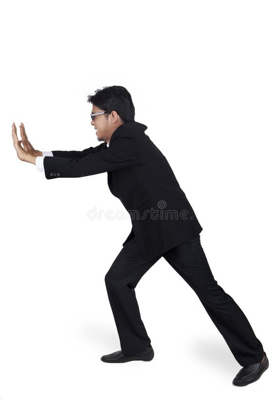Businessman Pushing Something Heavy on Copyspace Stock Photo - Image of ...
