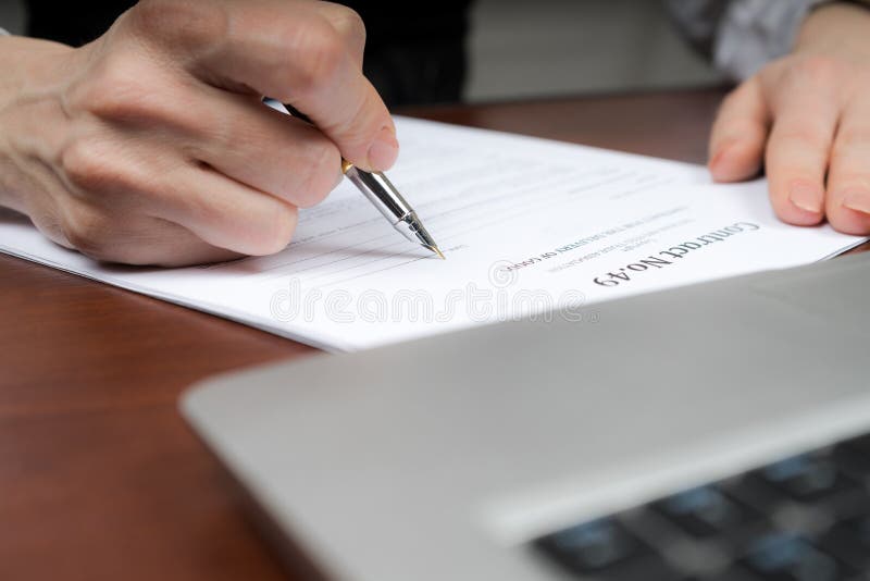 A Businessman Puts His Signature on the Contract. Copy Space. Stock ...