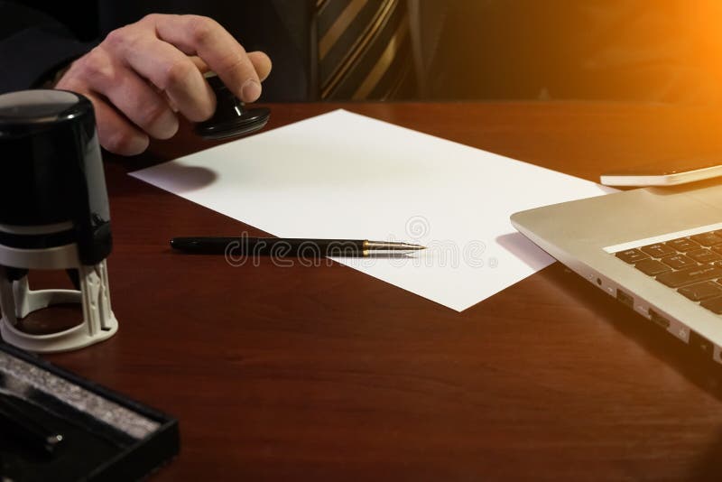 The Businessman Puts a Stamp on the Contract Stock Photo - Image of ...
