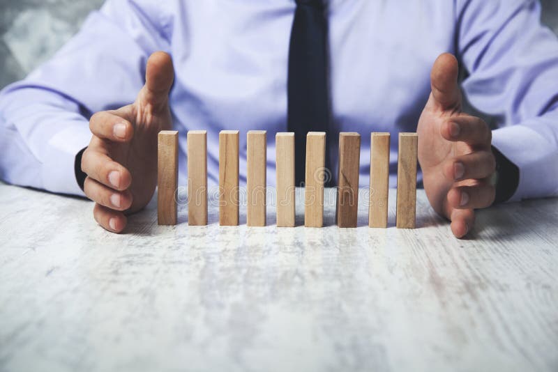 Businessman Putting Hands on Surface with Wooden Cubes Stock Photo ...