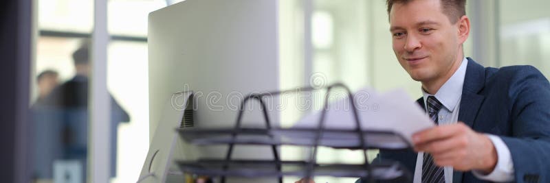 Businessman Putting Paper Documents on Stand on Table in Office Stock ...