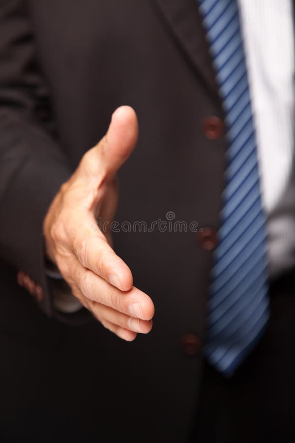 Businessman Reaching Out for Handshake Stock Photo - Image of clothing ...