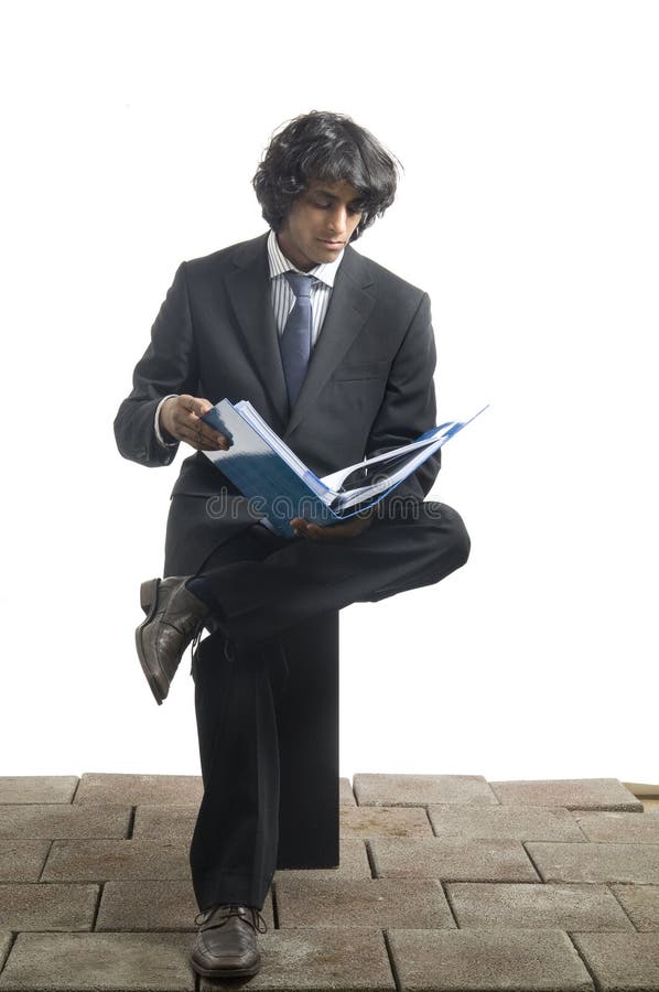 Businessman reading stock image. Image of mature, senior - 13376345