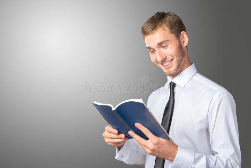 Businessman reading a book stock image. Image of book - 66077341