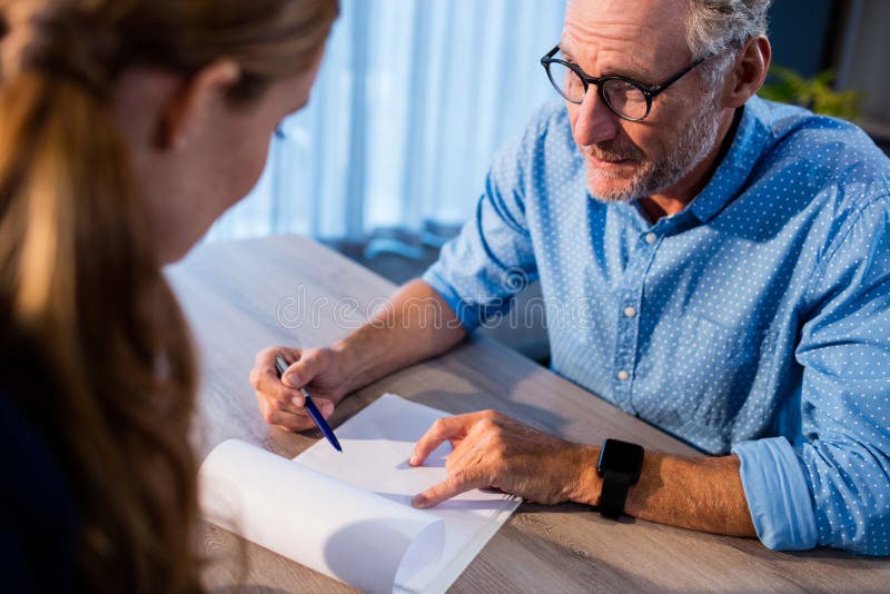 Businessman Reading a Document Stock Image - Image of people, elegant ...
