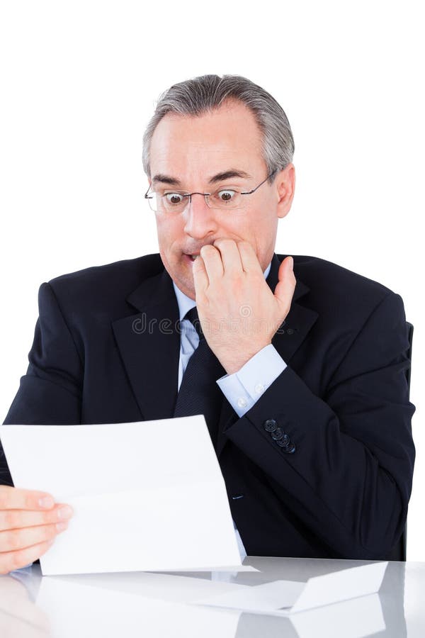 Businessman Reading Document Stock Photo - Image of holding, hand: 53187056