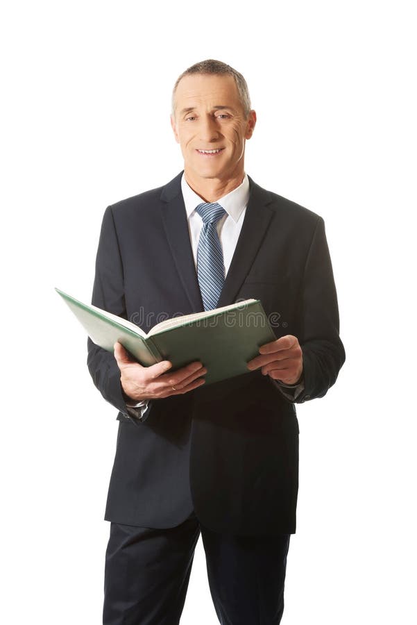 Businessman Reading His Note Book Stock Photos - Free & Royalty-Free ...