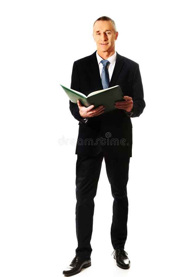 Businessman Reading His Note Book Stock Photos - Free & Royalty-Free ...