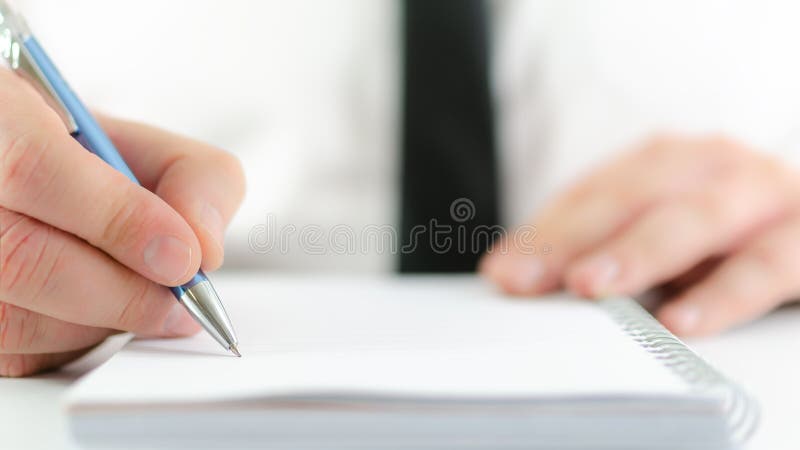 Businessman Ready To Take Notes on an Empty Note Pad Stock Image ...