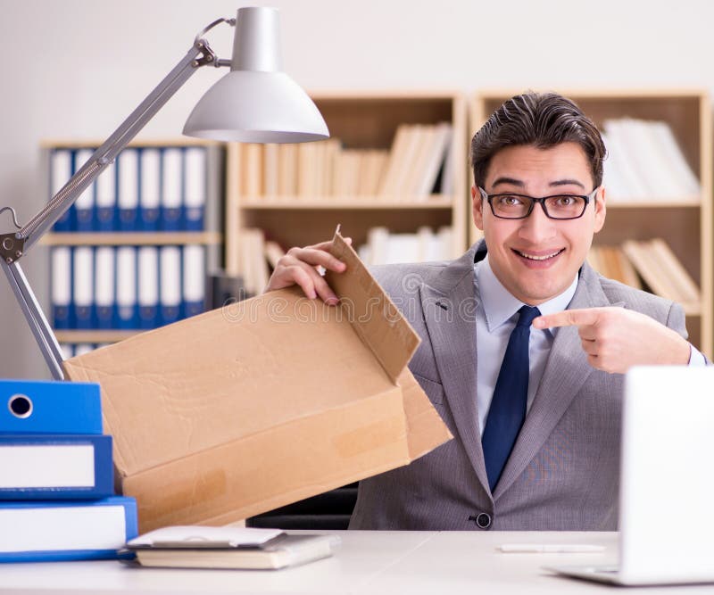 Businessman Receiving Parcel in the Office Stock Image - Image of nice ...