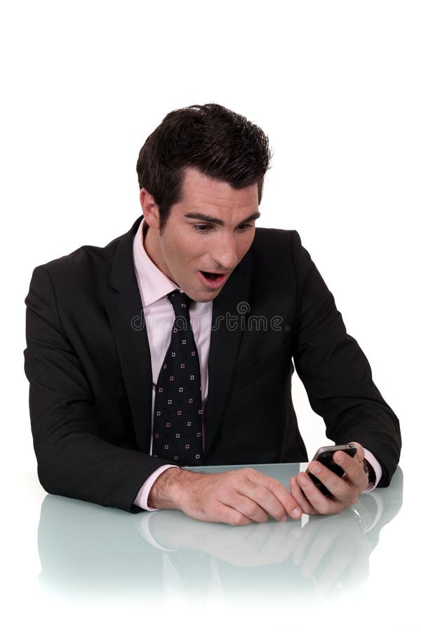 Businessman Receiving Text Message Stock Image - Image of conference ...