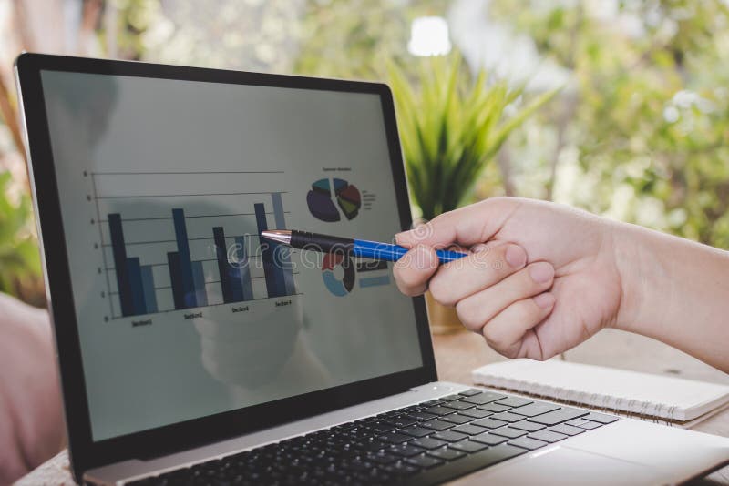 Businessman Relaxed Pointing Strategy Graph Chart Report and Working on ...