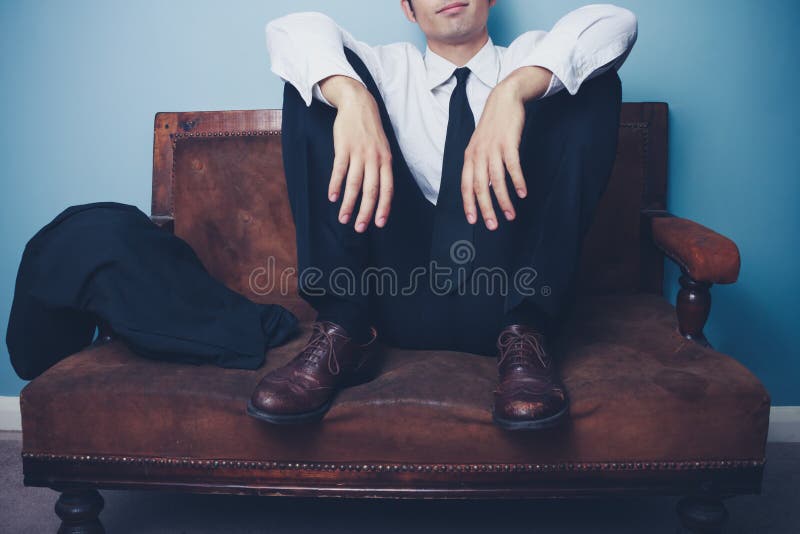 Businessman Relaxing after Long Day at Work Stock Photo - Image of ...