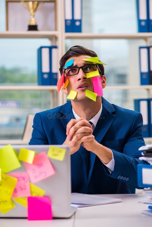 The Businessman with Reminder Notes in Multitasking Concept Stock Photo ...