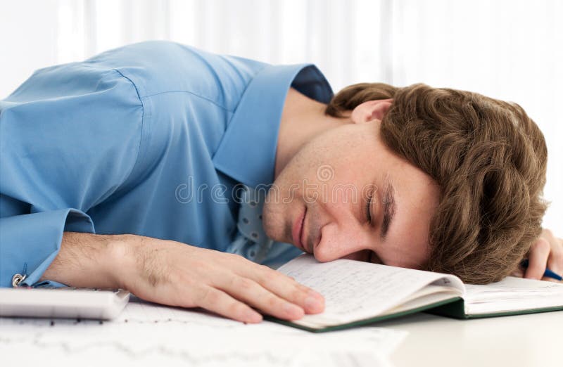 Businessman Resting Head on Notebook Stock Photo - Image of male ...
