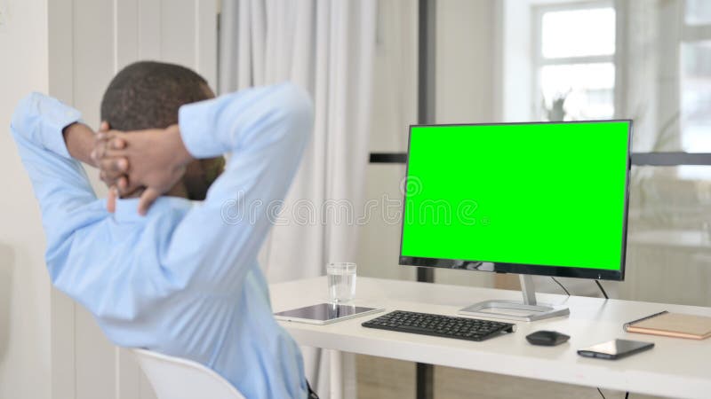 Businessman Resting while Using Desktop with Green Chroma Key Screen ...
