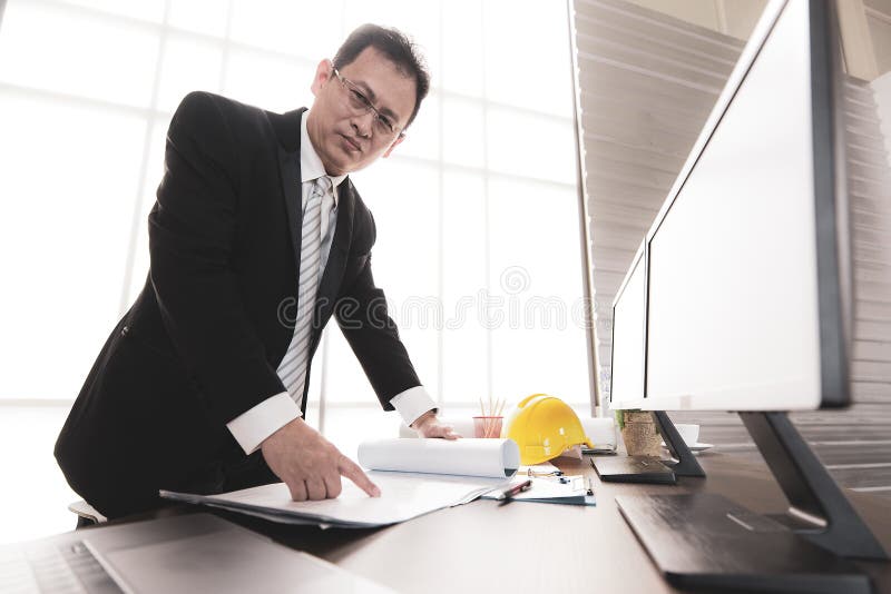 Businessman Reviewing Plan Design Stock Image - Image of drawing ...