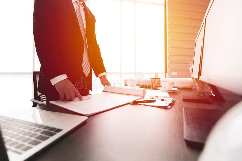 Businessman Reviewing Plan Design Stock Photo - Image of modern ...
