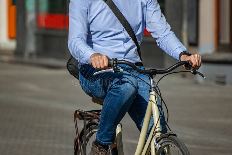 Businessman Rides To Work on a Bicycle. Elegantly Dressed Man Riding a ...