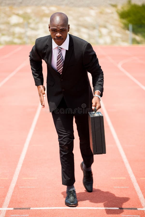 Businessman Running on a Running Track Stock Photo - Image of ...