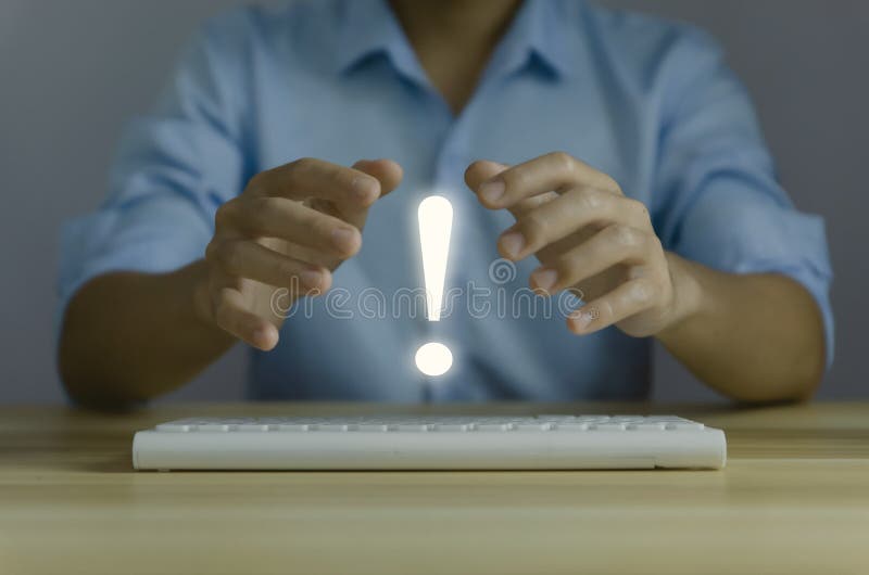 The Businessman S Hand Shows a White Exclamation Mark. Business ...