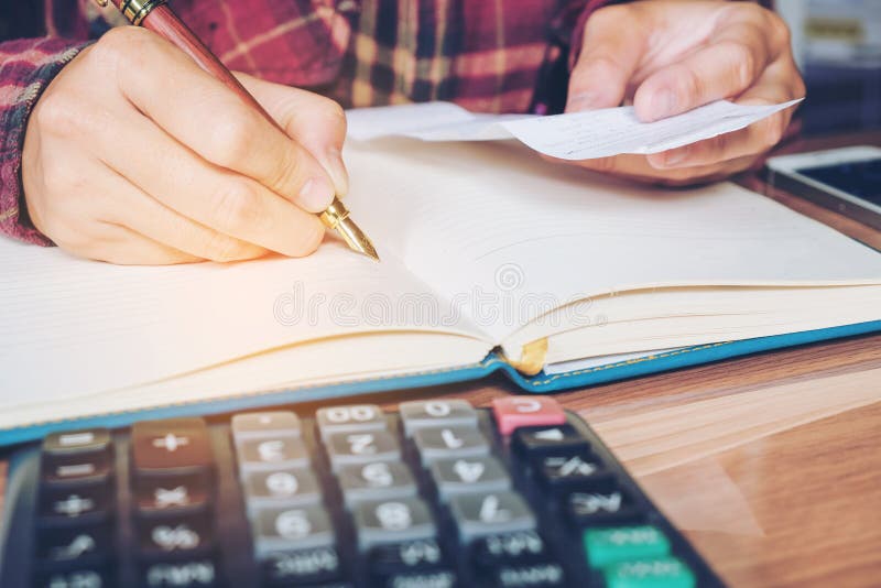 Businessman S Hands with Calculator Counting Making Notes at Hom Stock ...