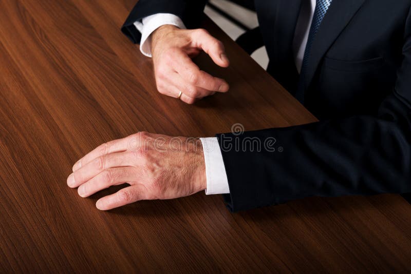 Hands on Table with Intertwined Fingers Stock Photo - Image of ...