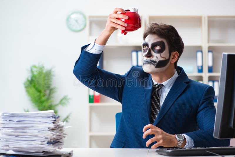 Businessman with Scary Face Mask Working in Office Stock Image - Image ...