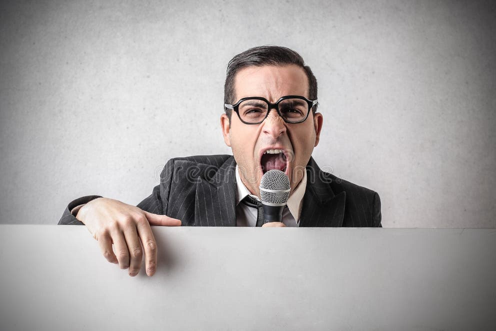 Businessman Screaming into the Microphone Stock Photo - Image of ...