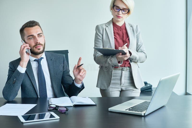 Secretary Talking To Boss in Office Stock Image - Image of business ...