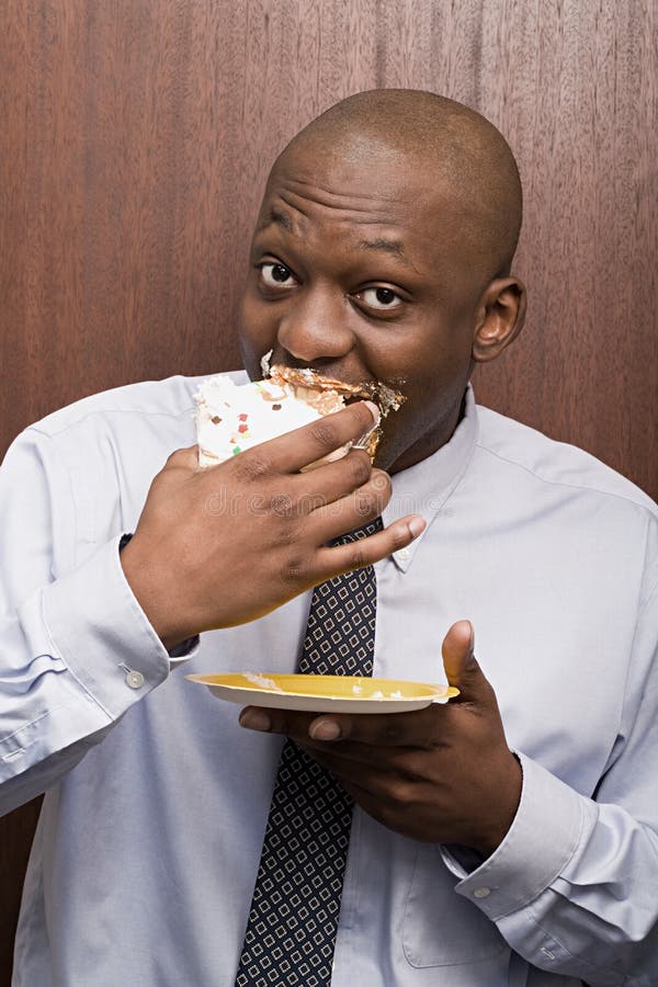 Businessman Secretly Eating Cake Stock Photos - Free & Royalty-Free ...