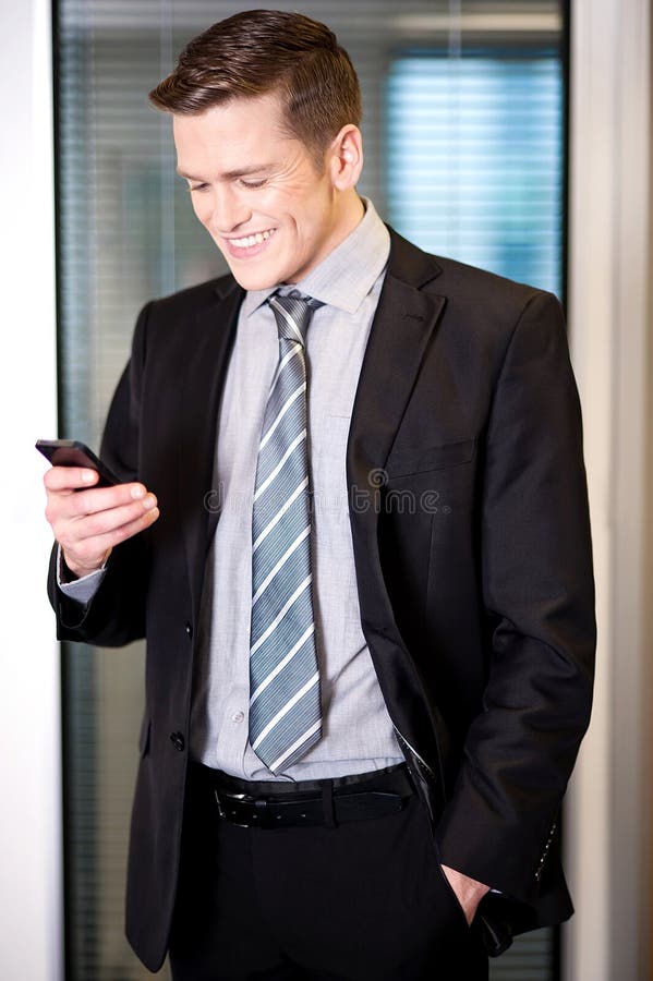 Businessman Sending Text Message Stock Photo - Image of cellphone ...