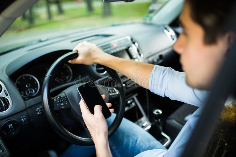 Young Man Sending a Text Message in His Car Stock Image - Image of ...