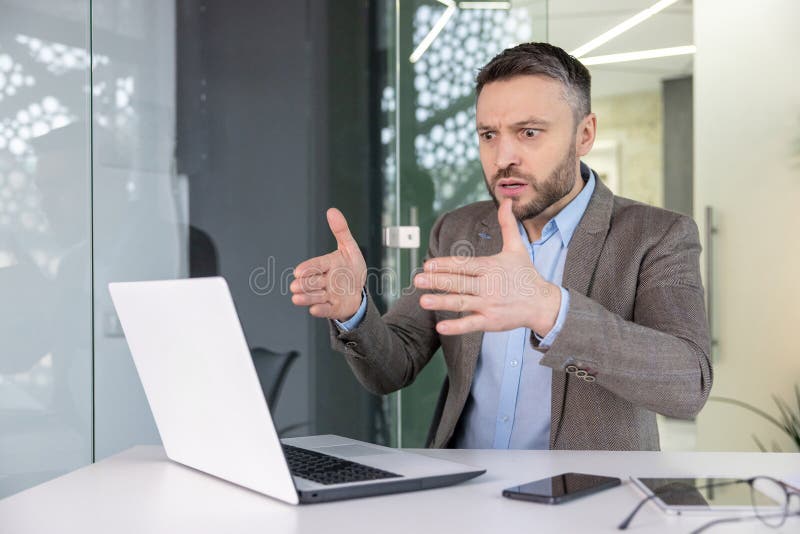 Businessman on a Serious Video Call from Office Stock Image - Image of ...