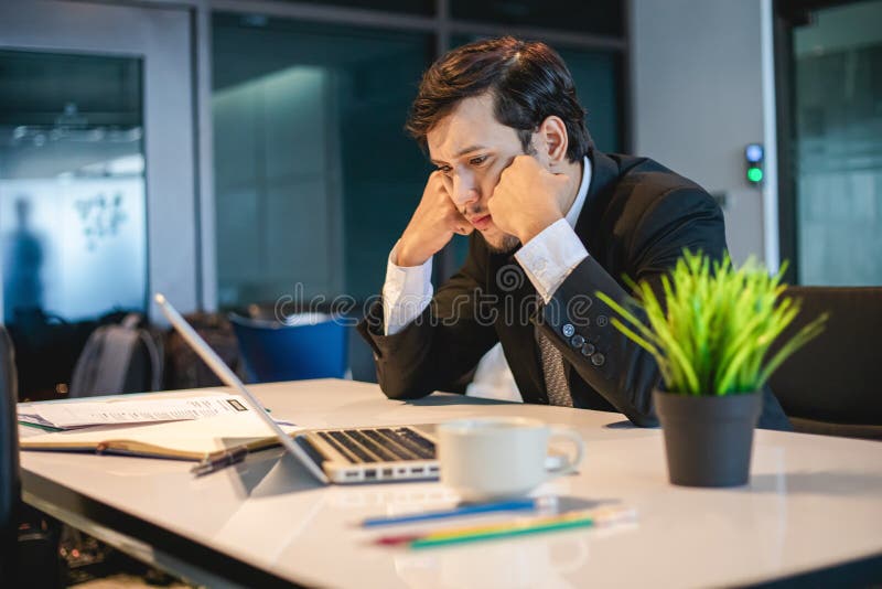 Businessman Serious about the Work Hard Done until the Headache Stock ...