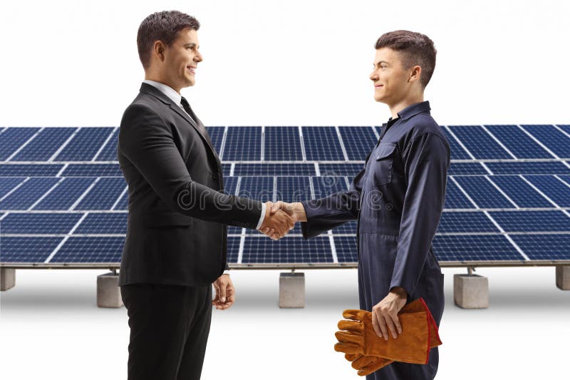 Businessman Shaking Hand with a Worker in Front of a Solar Panel Stock ...