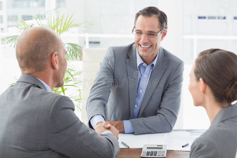 Businessman Shaking Hands with a Co Worker Stock Image - Image of ...