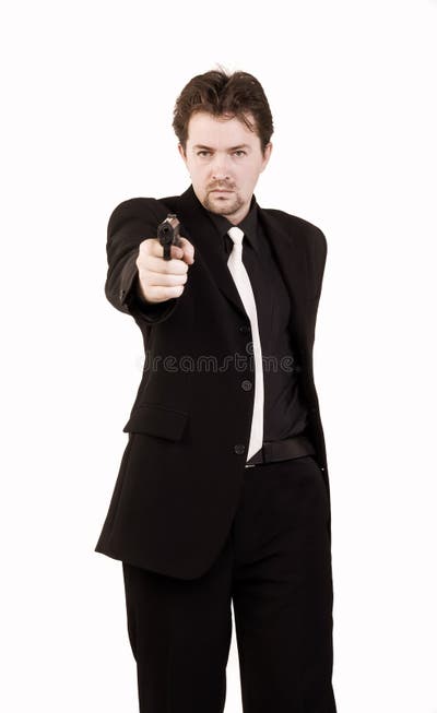 Businessman shoots a gun stock photo. Image of elegance - 17009768