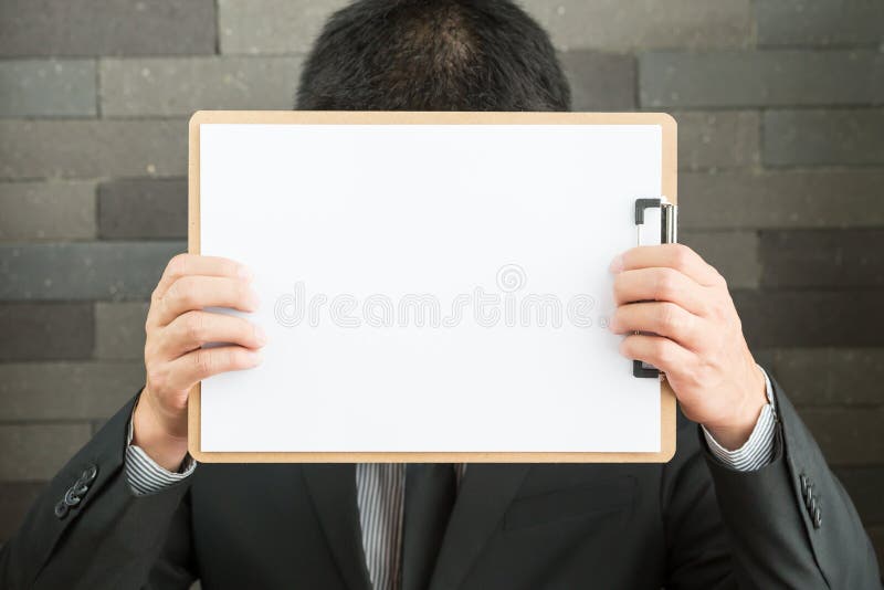 Businessman Showing Blank Document Stock Photo - Image of paper, hold ...