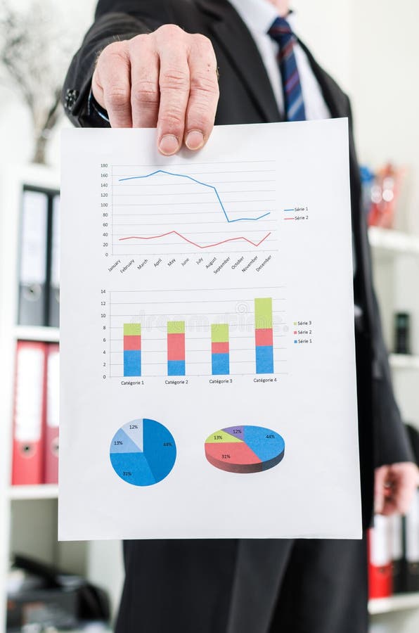 Businessman Showing Charts and Graphics Stock Image - Image of graphic ...