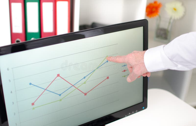 Businessman Showing a Graph on the Screen Stock Photo - Image of ...
